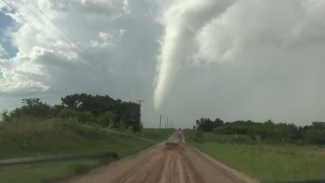 Video captures tornado on the ground, roping out and disappearing in ...